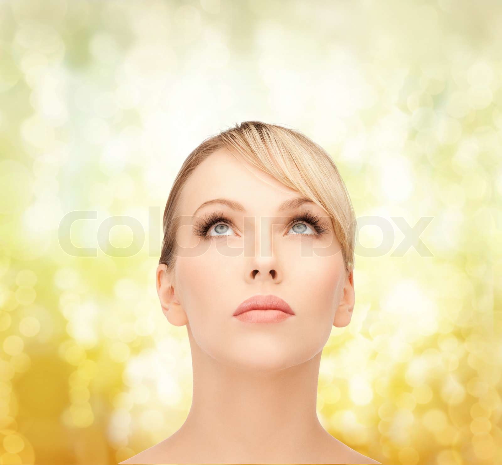 beautiful woman looking up | Stock image | Colourbox