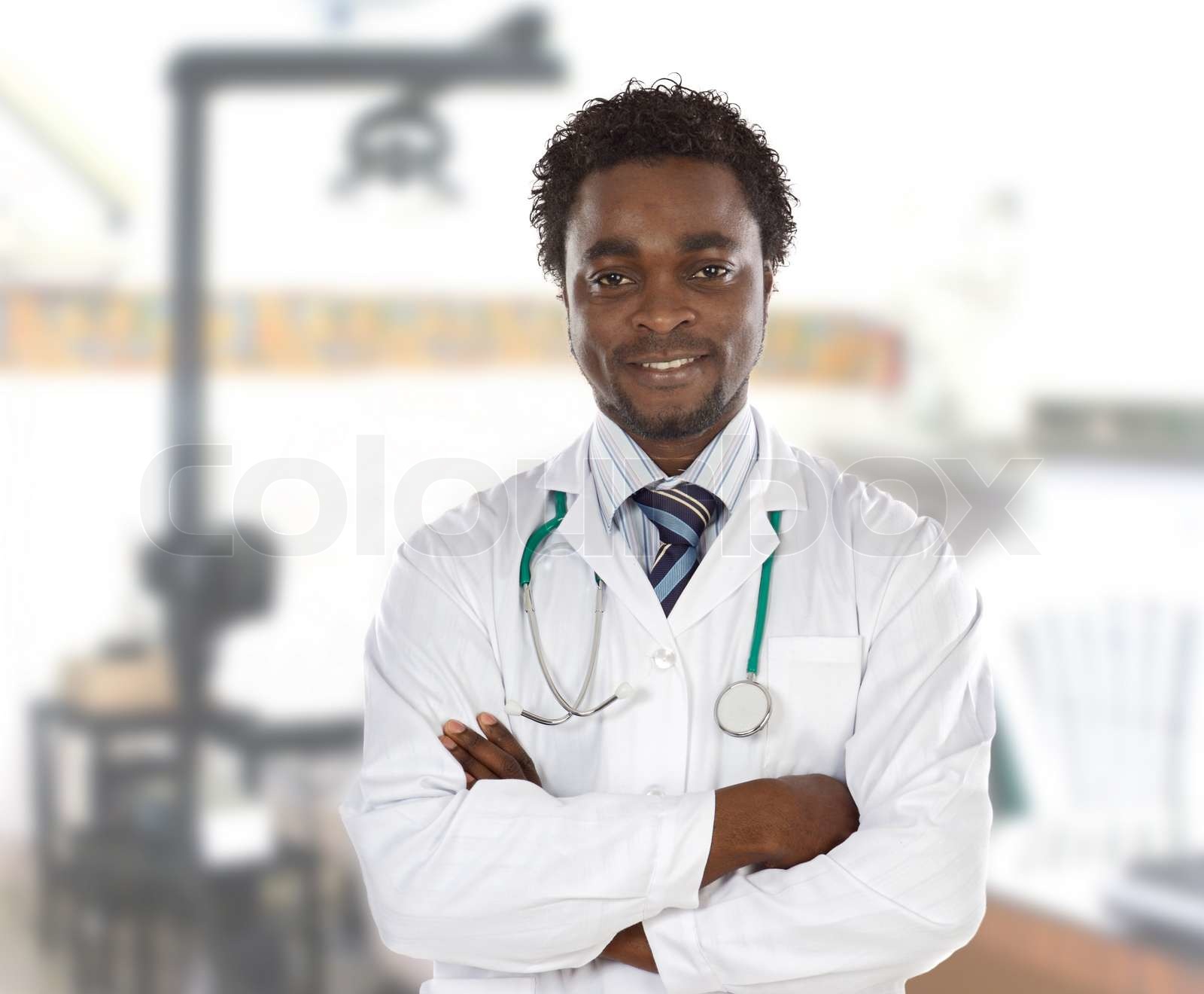 Happy african doctor at the hospital | Stock image | Colourbox