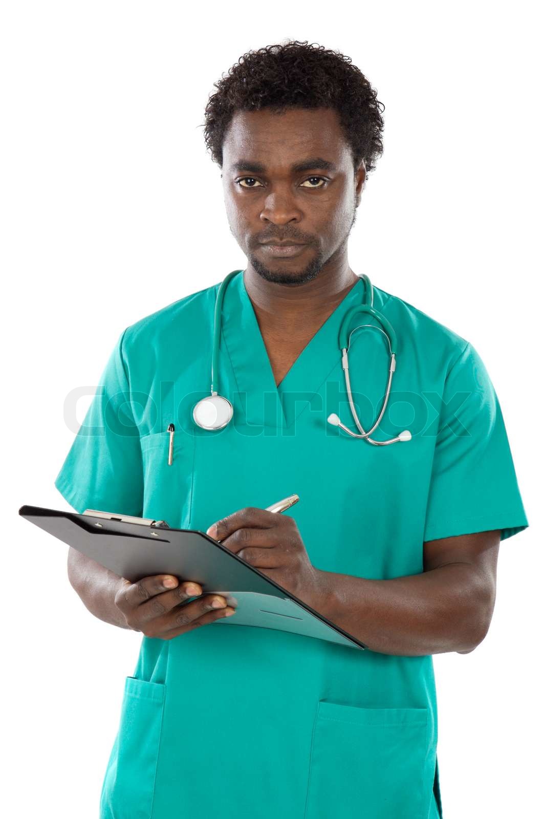 Young black doctor writing | Stock image | Colourbox