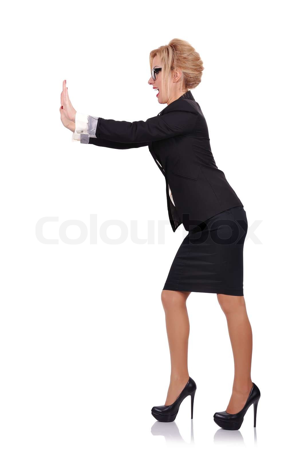 businesswoman pushing | Stock image | Colourbox