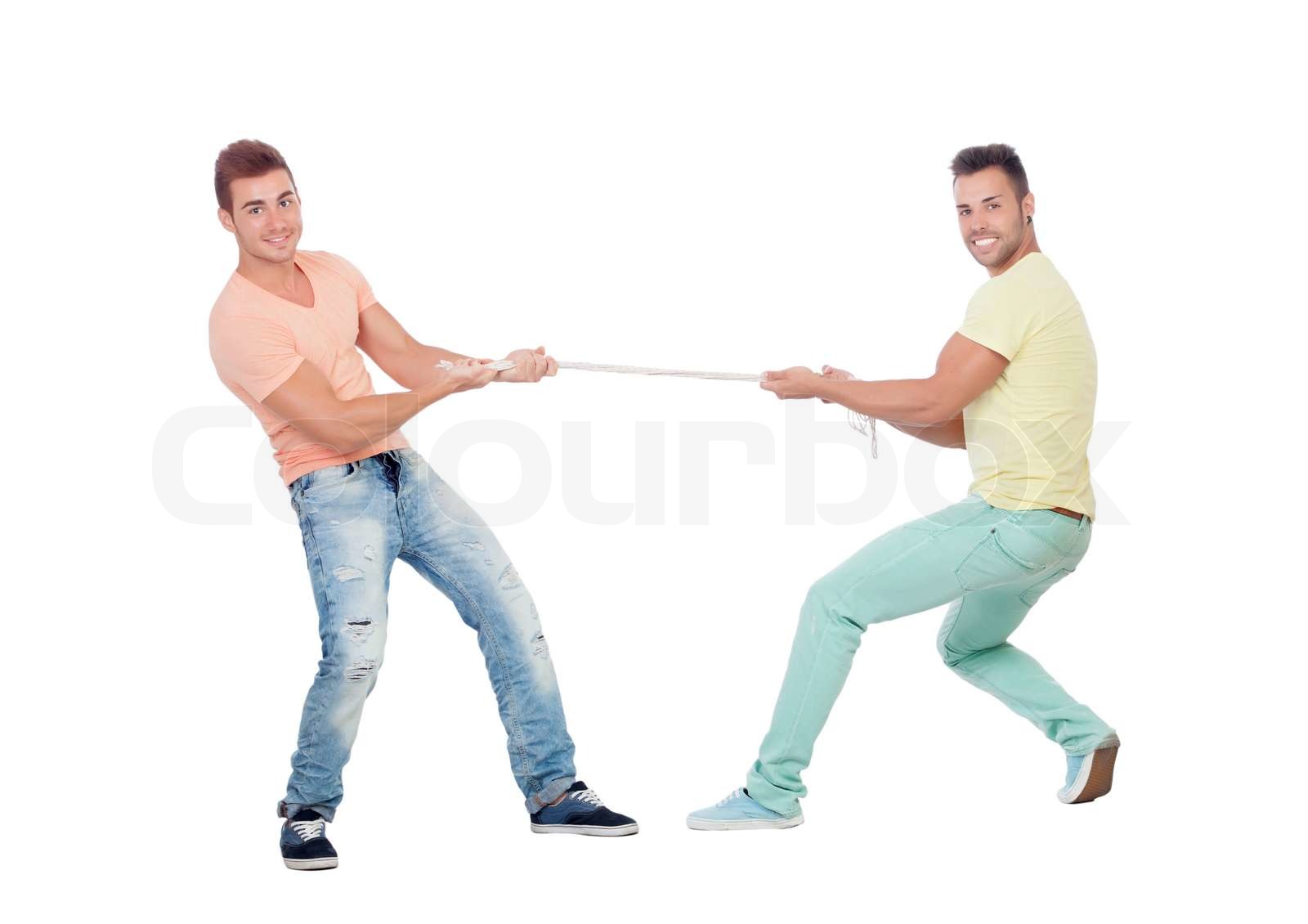 Two boys pulling a rope | Stock image | Colourbox