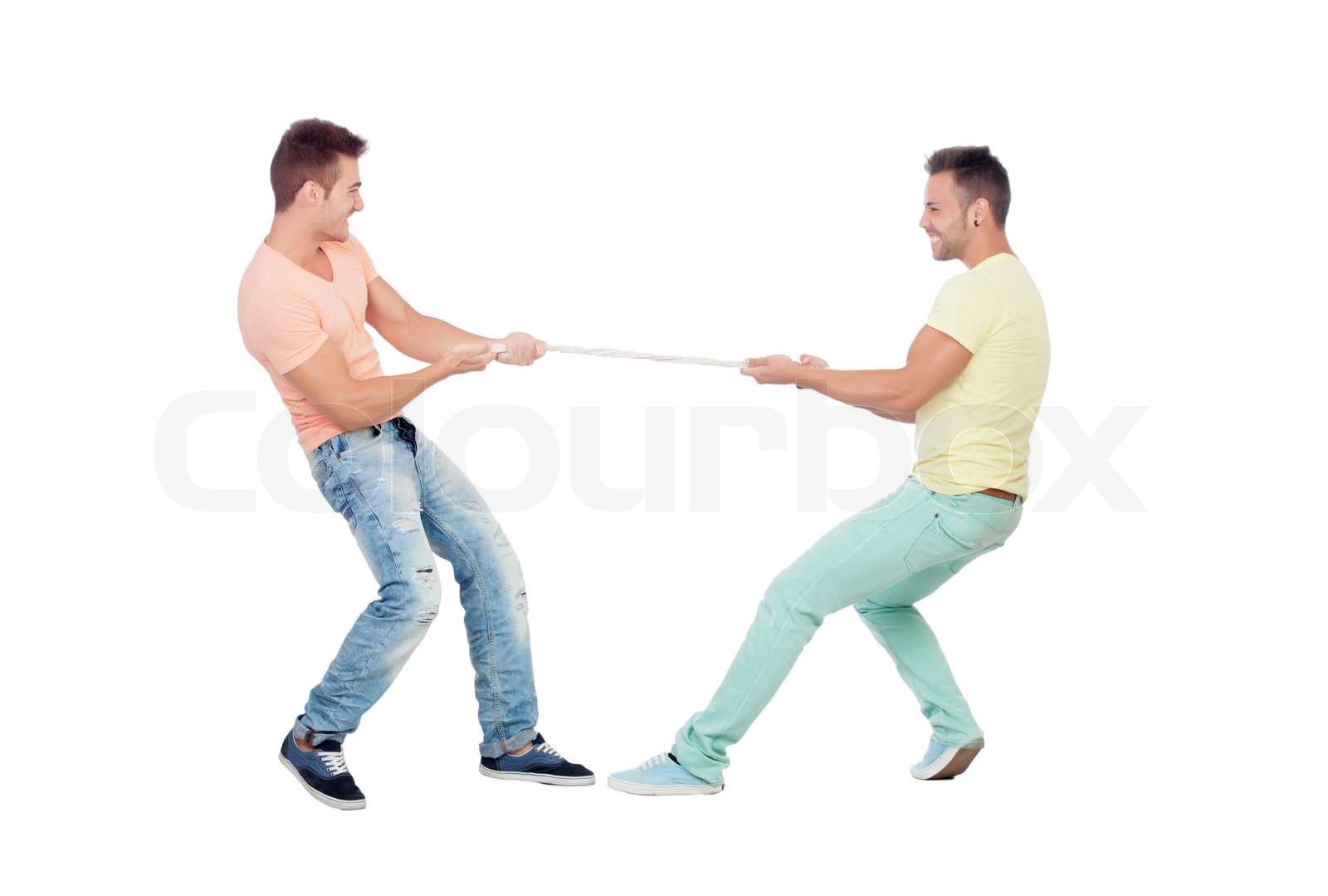 Two boys pulling a rope | Stock image | Colourbox