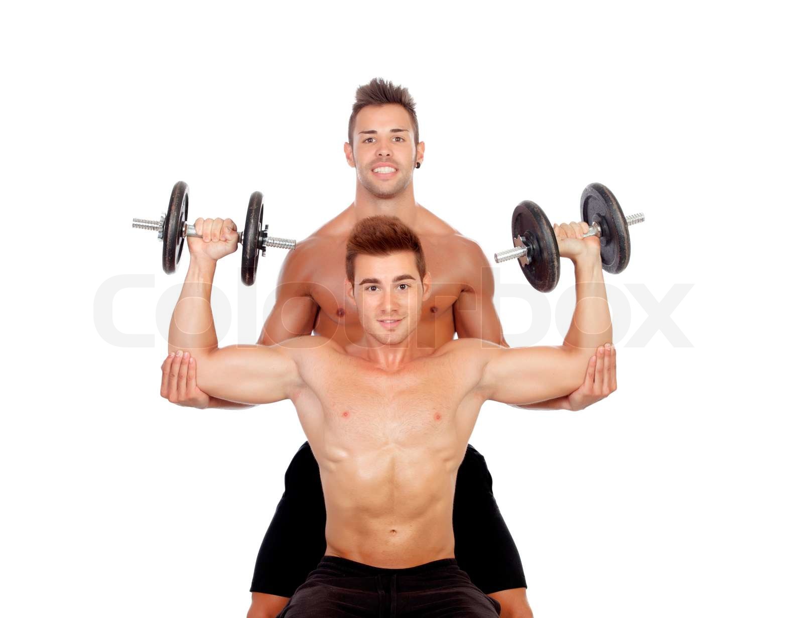 Couple of friends lifting weights | Stock image | Colourbox