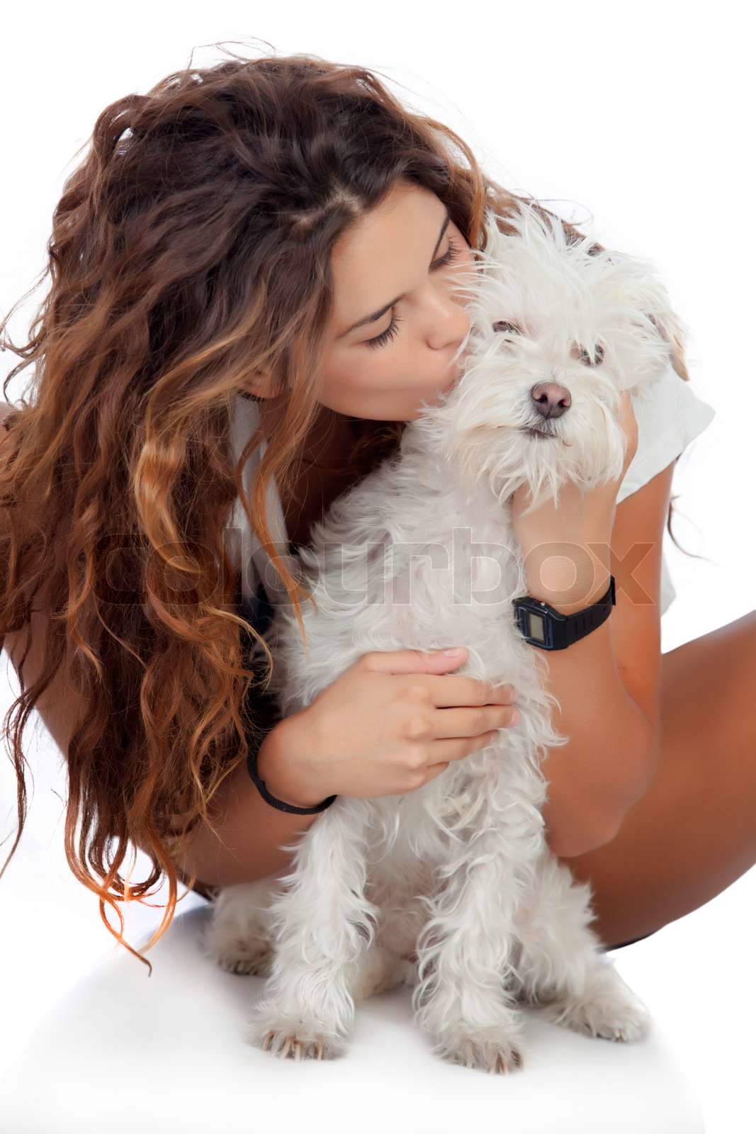 Happy girl with her dog isolated | Stock image | Colourbox