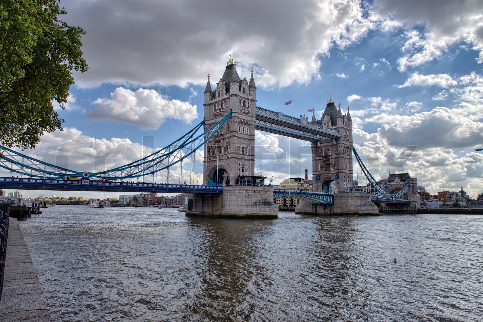 Side view of Tower Bridge with river Thames, London | Stock image ...