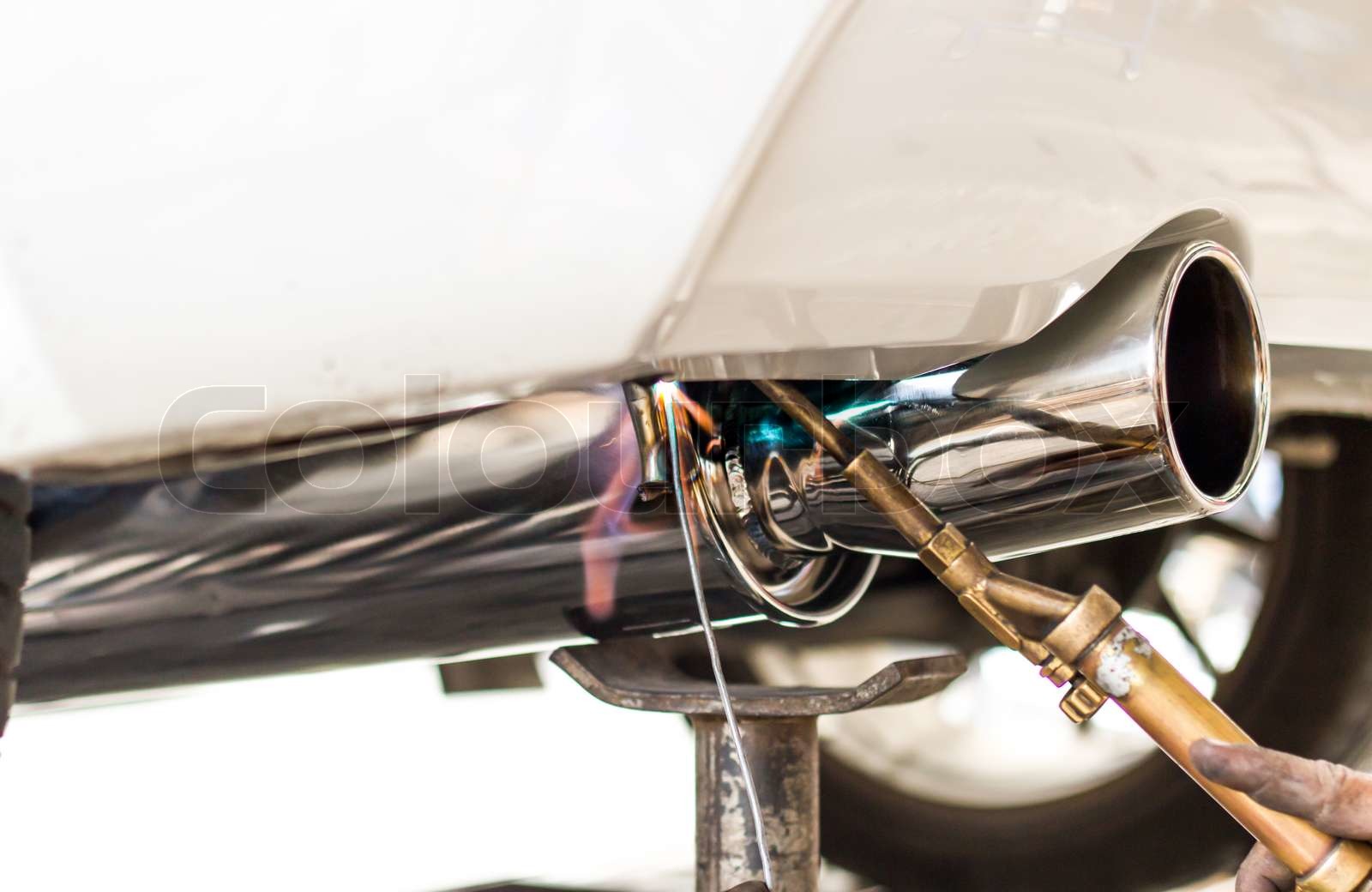 Cars pipe installation | Stock image | Colourbox