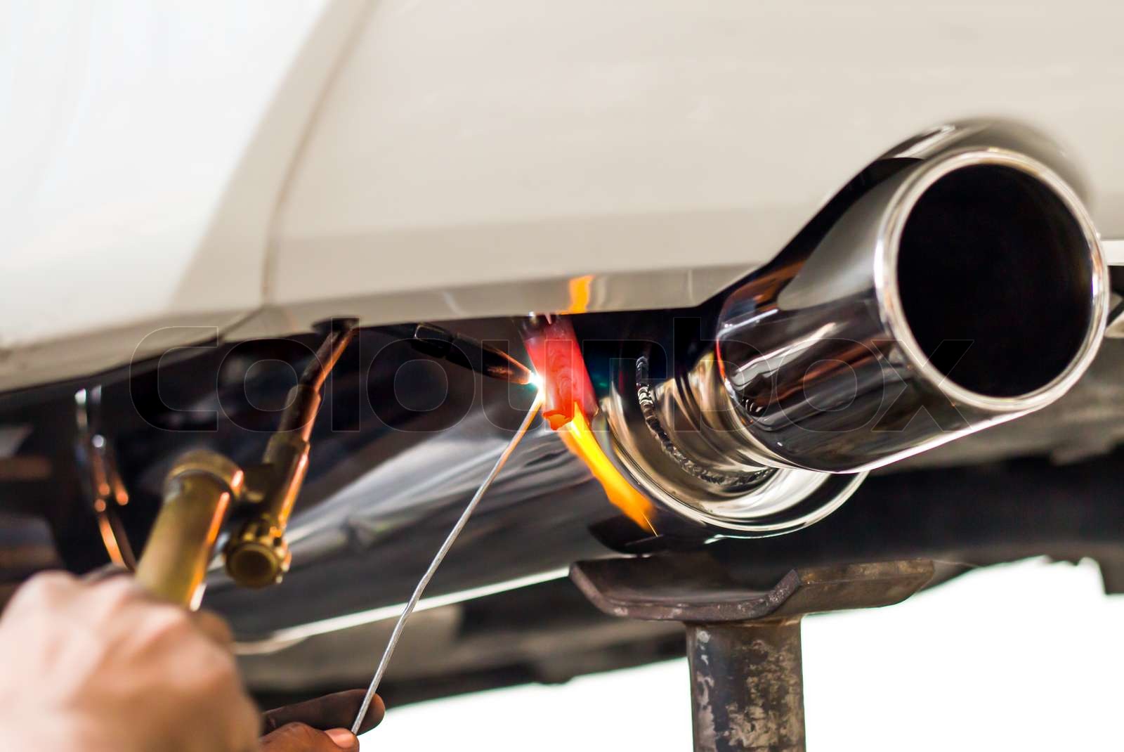 Cars pipe installation | Stock image | Colourbox