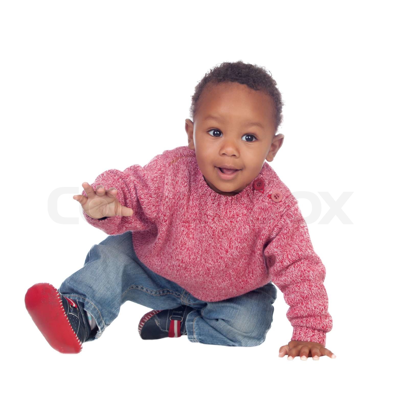Beautiful African American baby crawling | Stock image | Colourbox