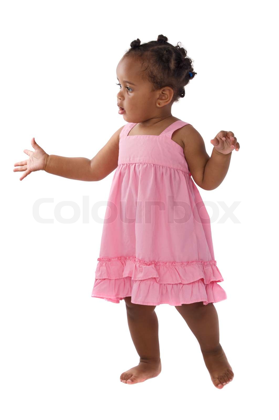 Adorable baby pink dressed | Stock image | Colourbox