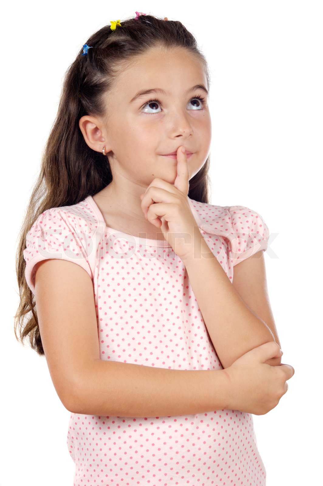 Adorable girl thinking | Stock image | Colourbox