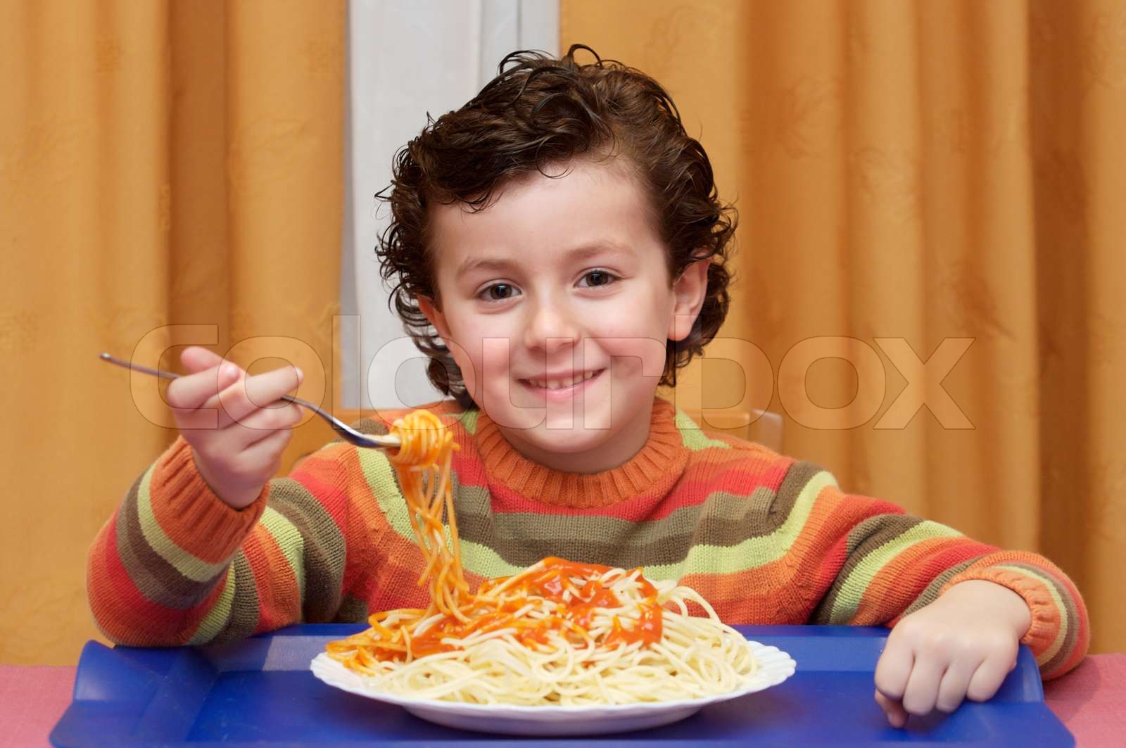 Child eating | Stock image | Colourbox