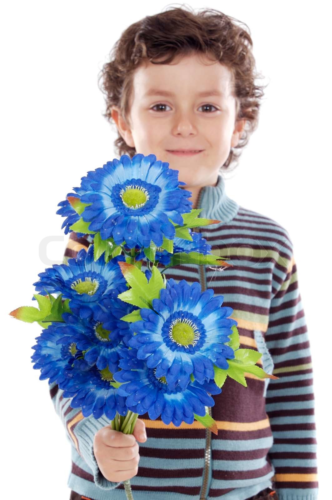 adorable boy with flowers | Stock image | Colourbox