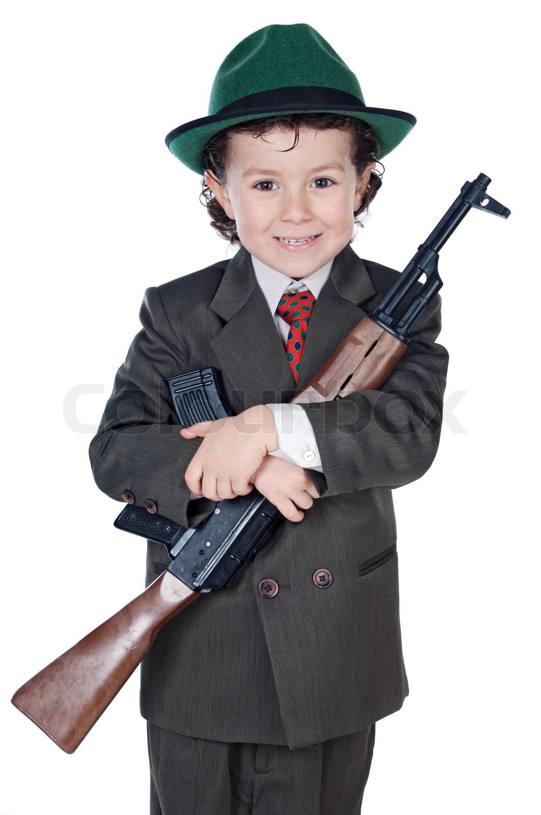 Boy with machine gun | Stock image | Colourbox