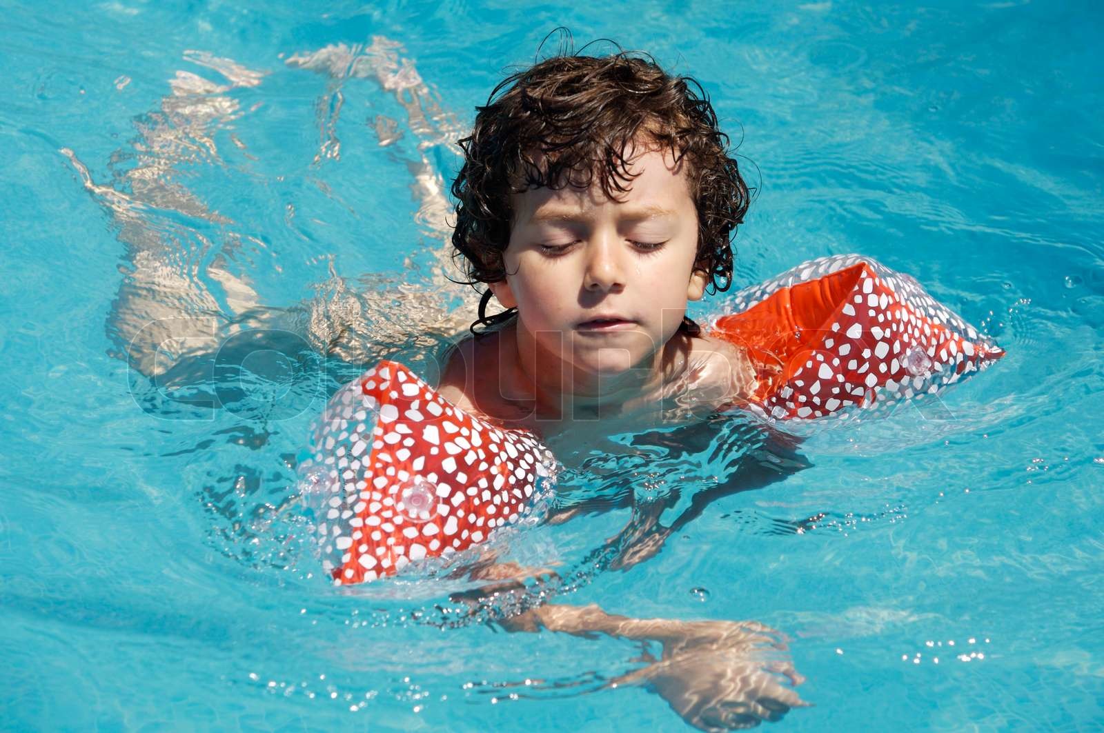 boy learning to swim | Stock image | Colourbox