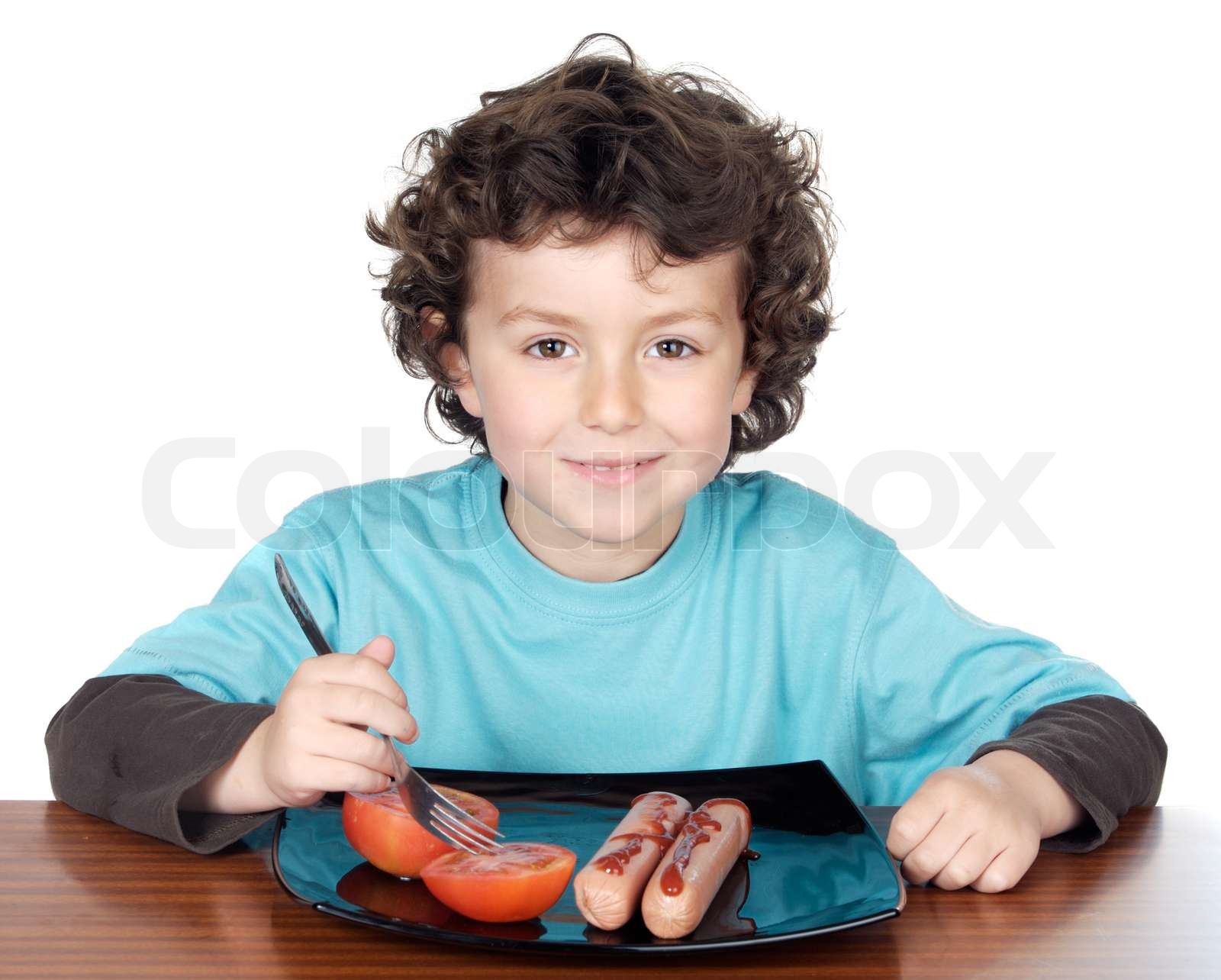 Adorable child eating | Stock image | Colourbox