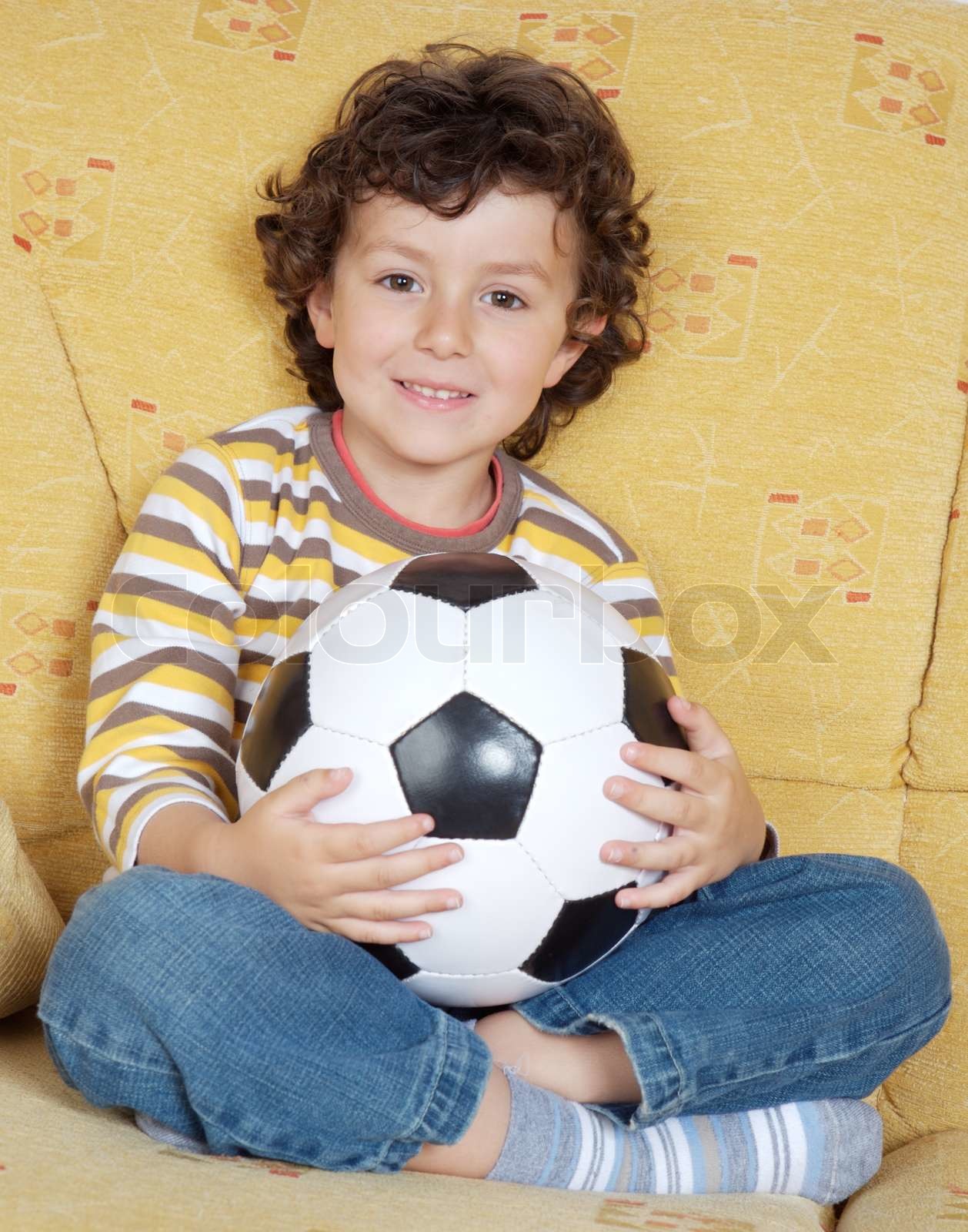 adorable boy with a ball | Stock image | Colourbox