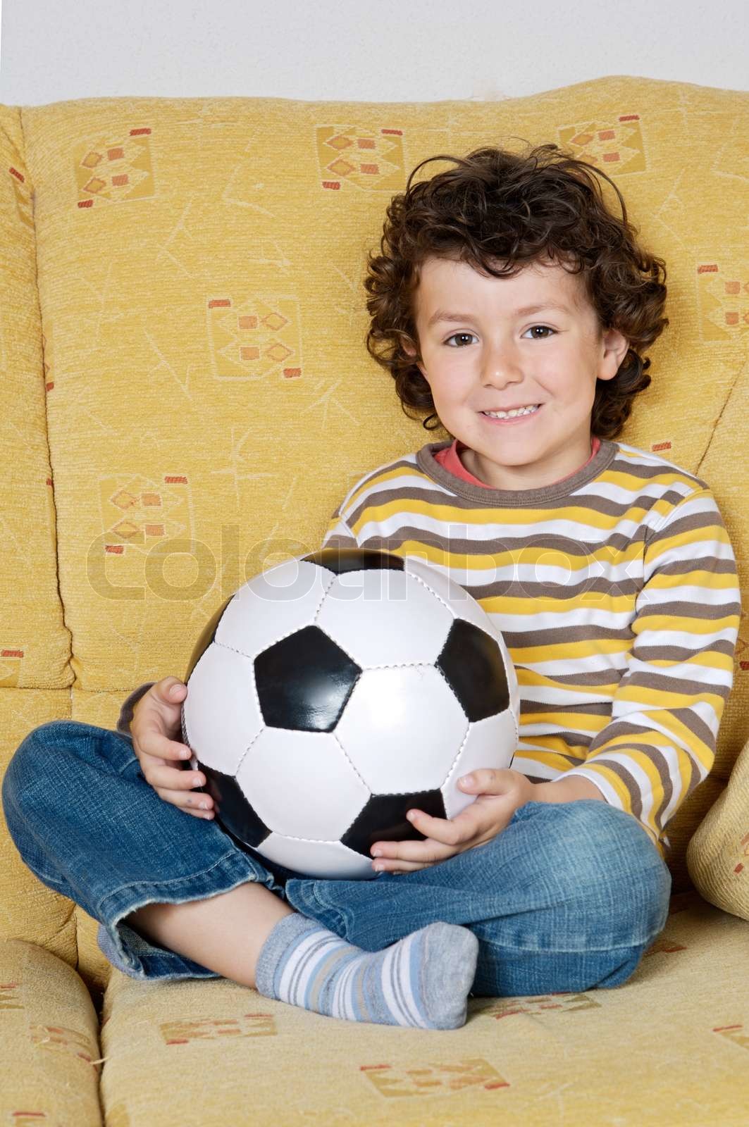adorable boy with a ball | Stock image | Colourbox