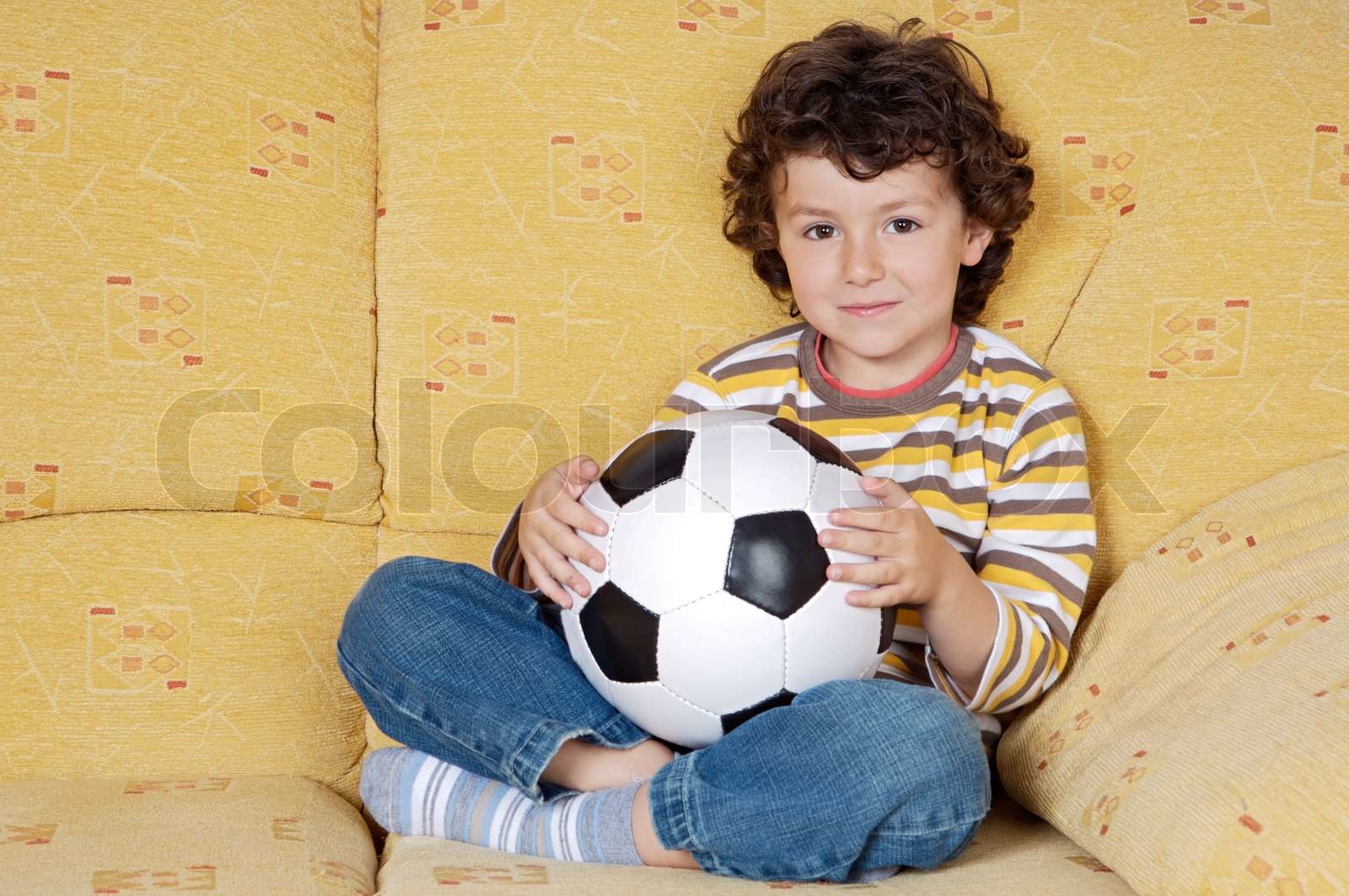 adorable boy with a ball | Stock image | Colourbox