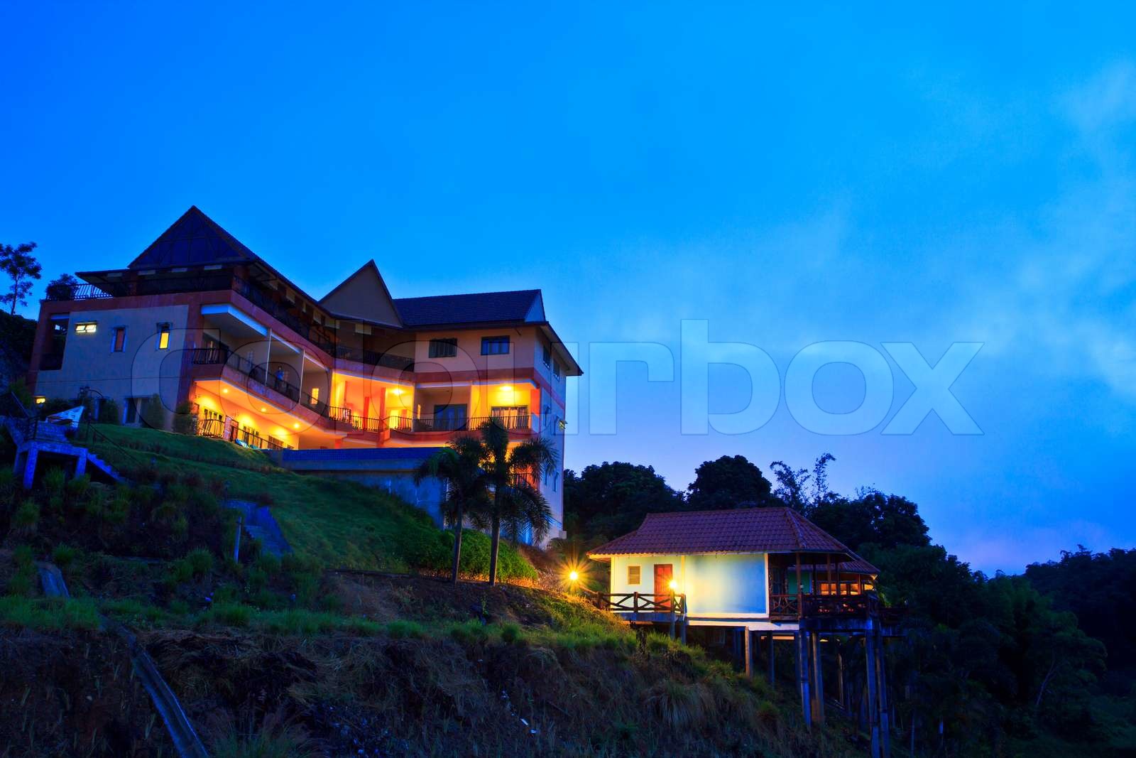 at a luxury resort at night, dawn time Resort and house | Stock image ...