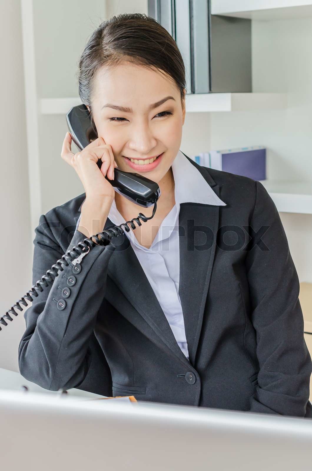 Young business women calling | Stock image | Colourbox