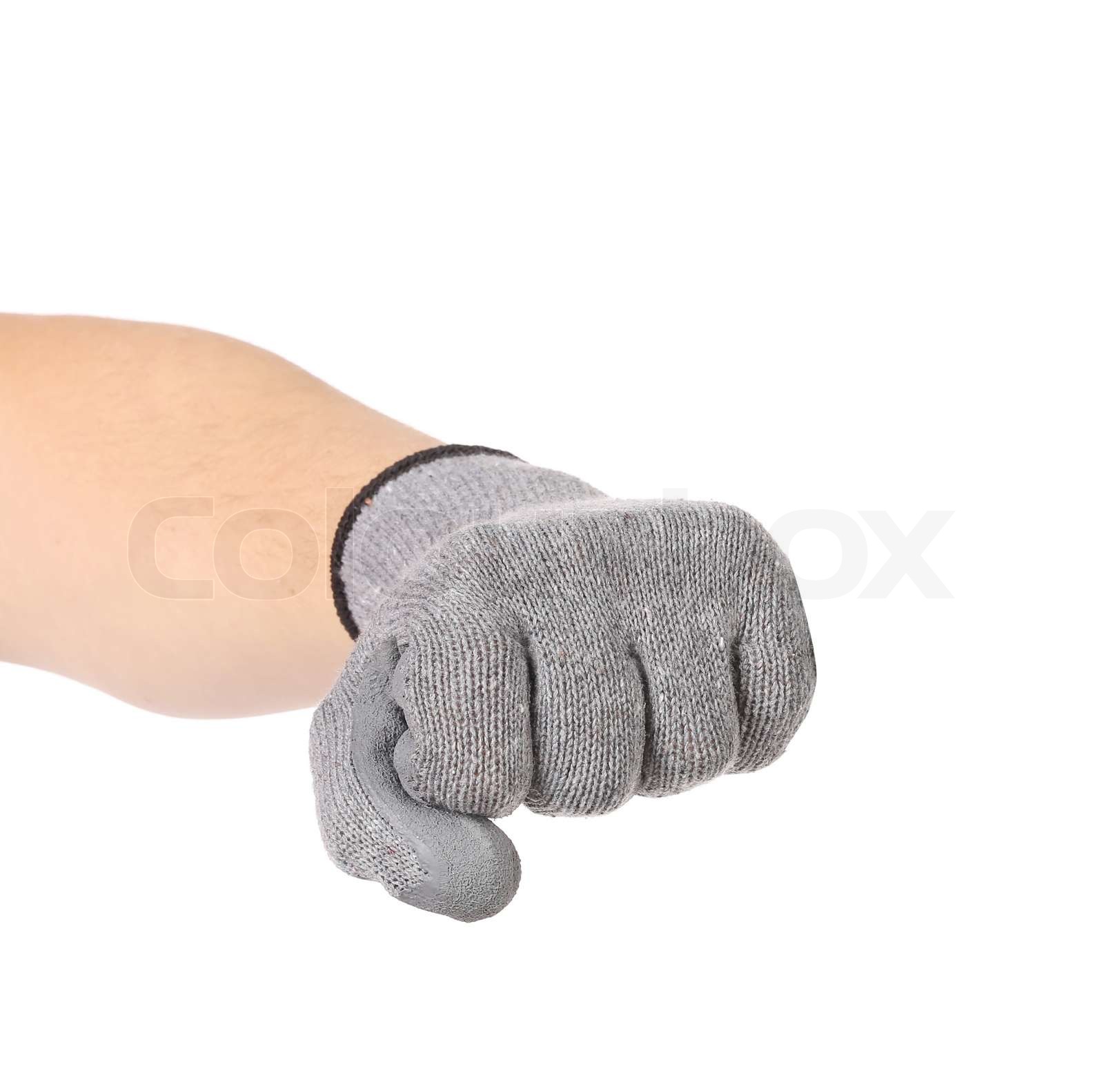 Strong male worker hand glove clenching fist. | Stock image | Colourbox