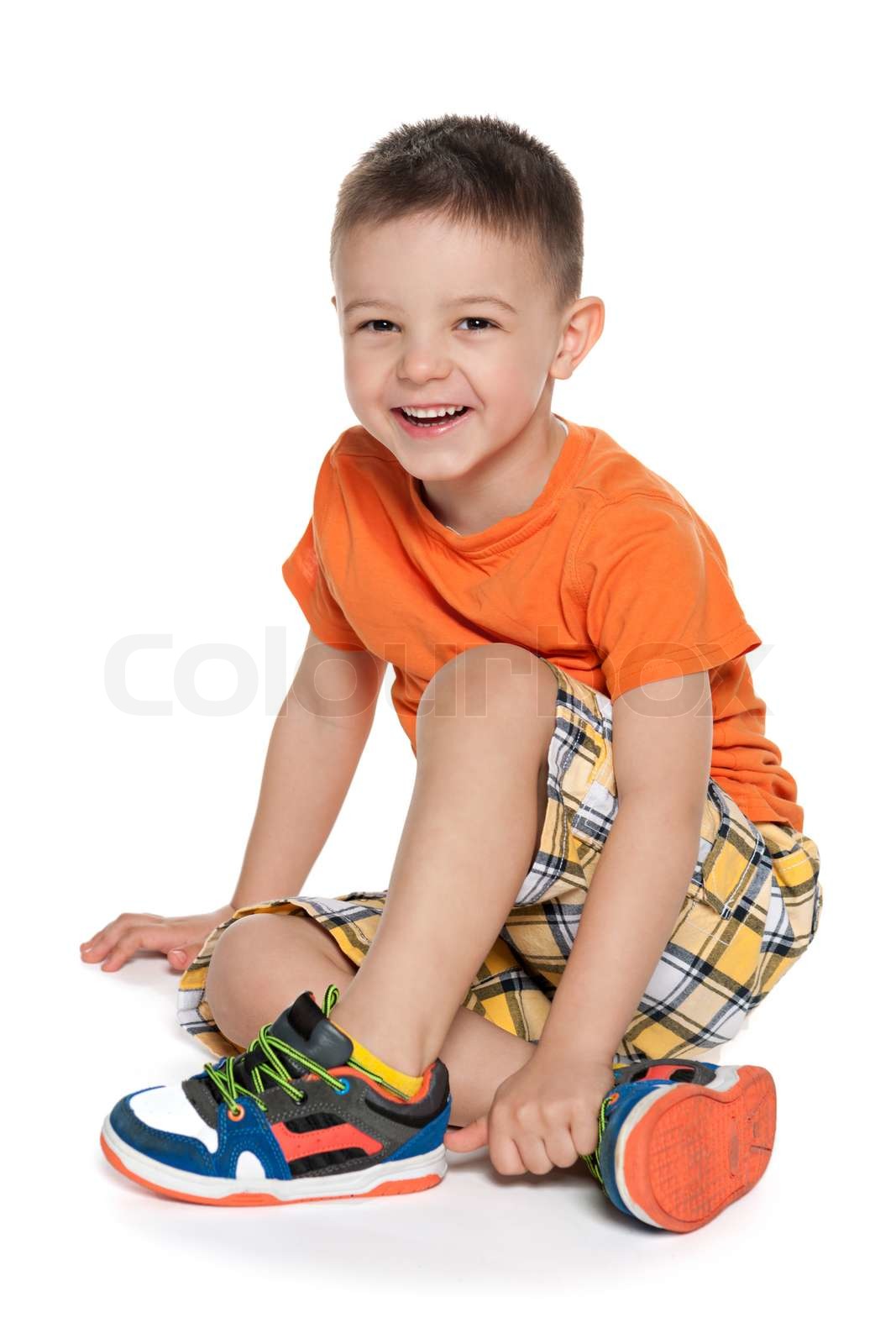 Laughing preschool boy | Stock image | Colourbox