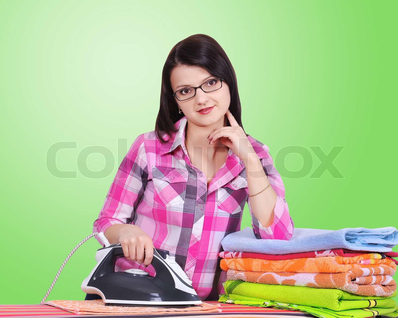 woman ironing clothes | Stock image | Colourbox
