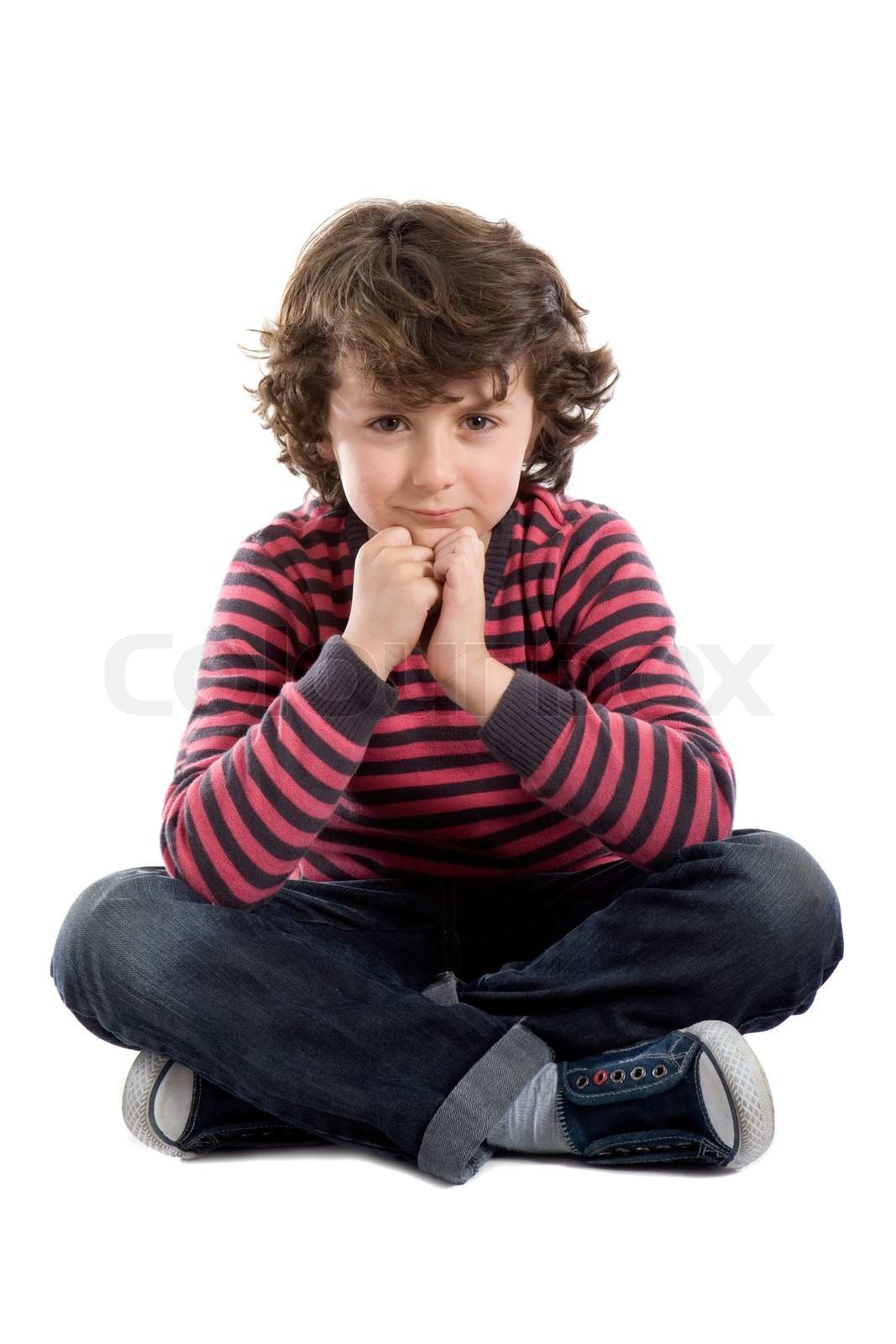 Adorable caucasian boy sitting | Stock image | Colourbox