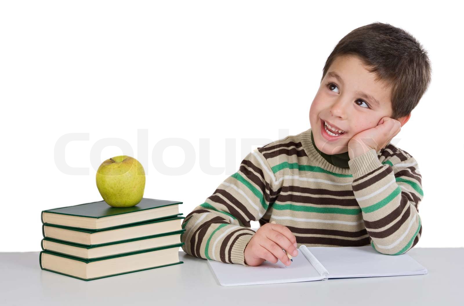 Adorable child thinking in the school | Stock image | Colourbox