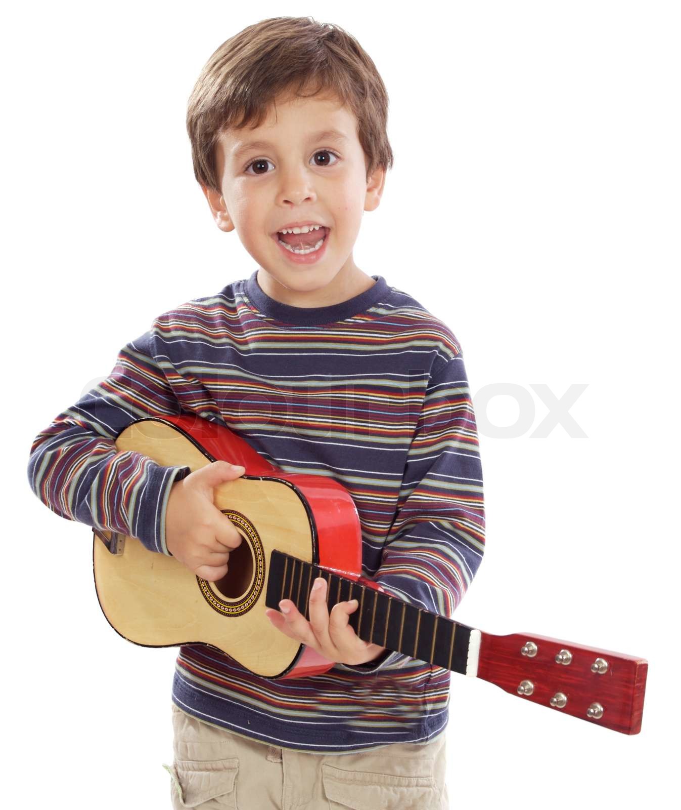 Kid with acoustic guitar | Stock image | Colourbox