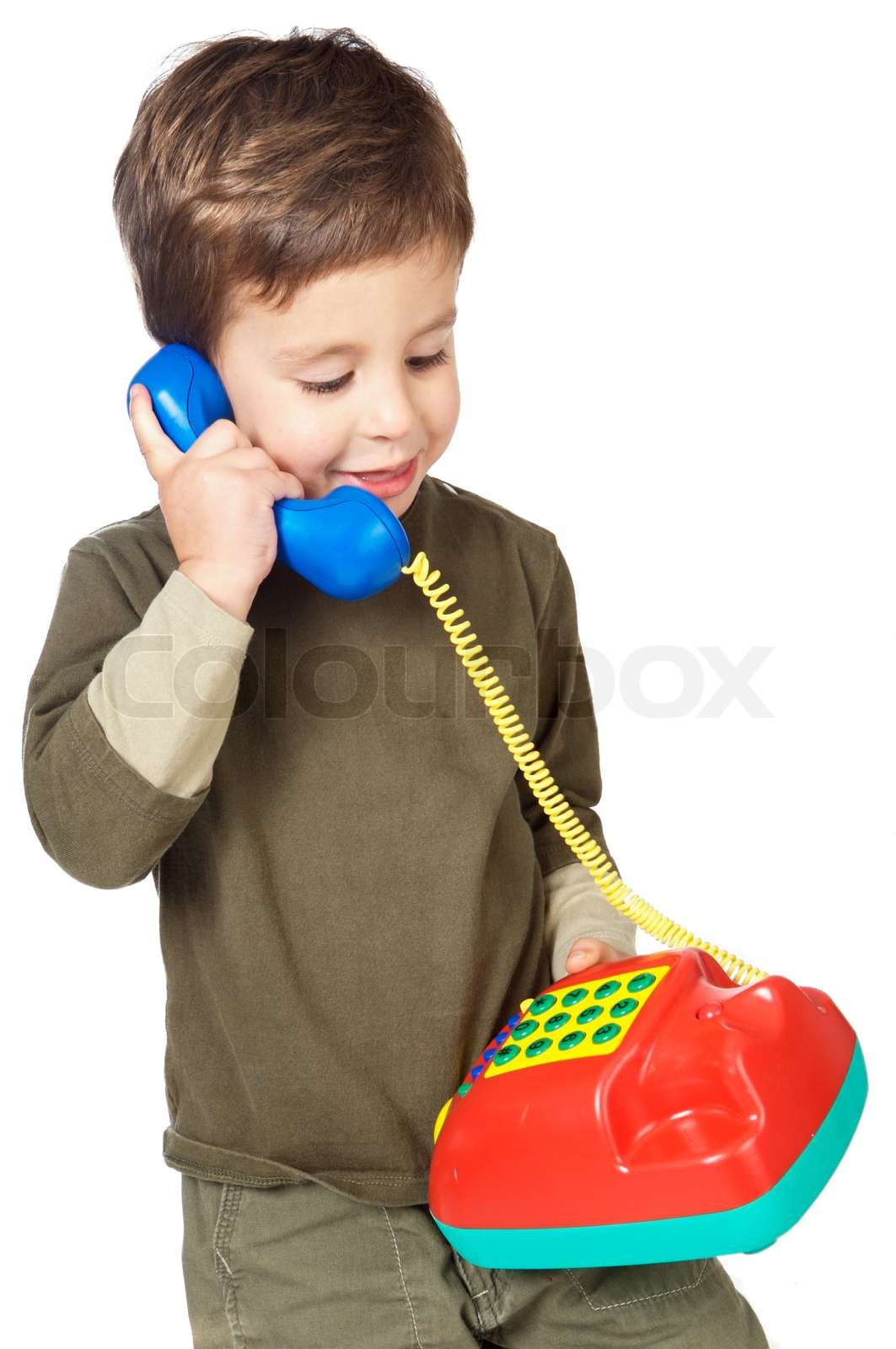 adorable boy speaking on the telephone | Stock image | Colourbox