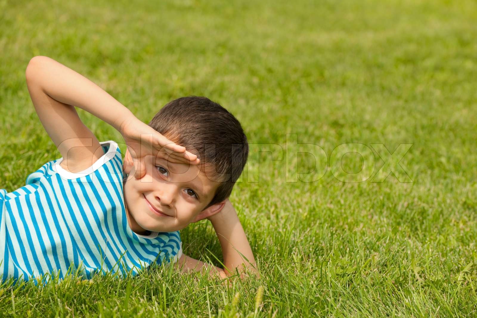 Looking into the distance little boy | Stock image | Colourbox