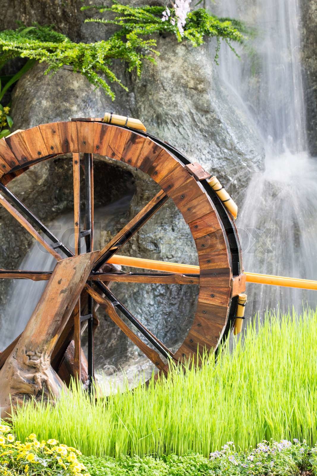 Water wheel turbine. The use falling water to irrigation .Thailand ...