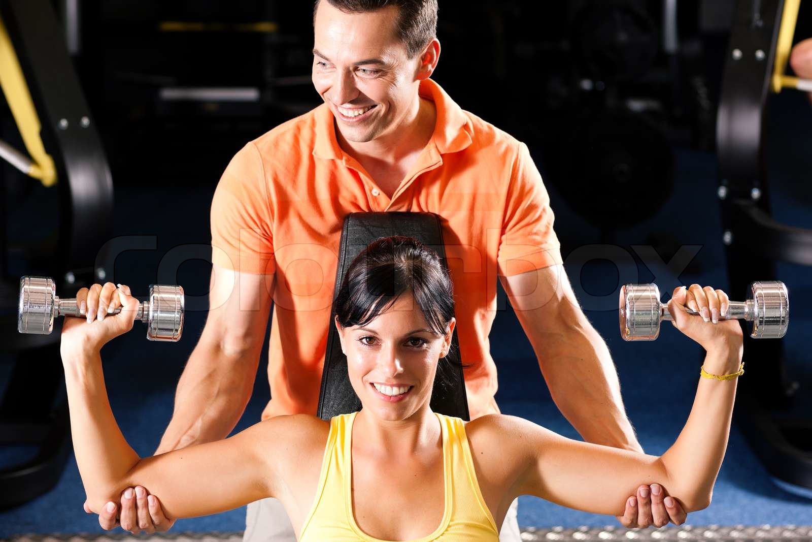 Personal Trainer in gym | Stock image | Colourbox