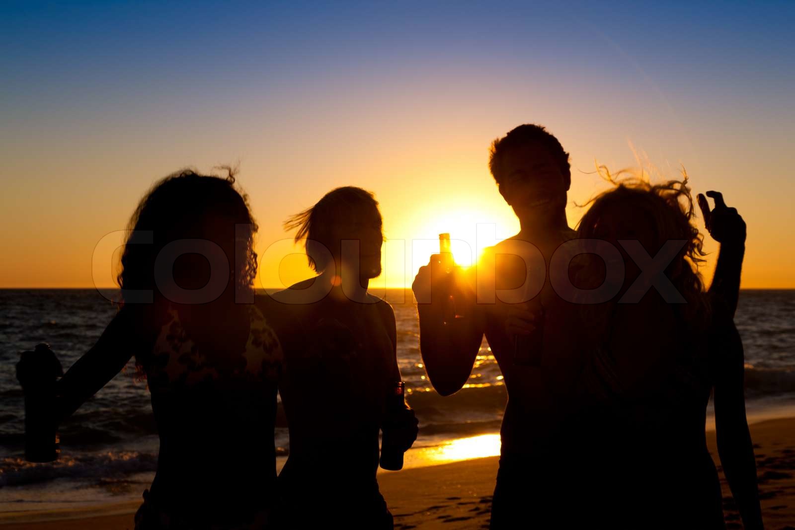People having party at beach with drinks | Stock image | Colourbox
