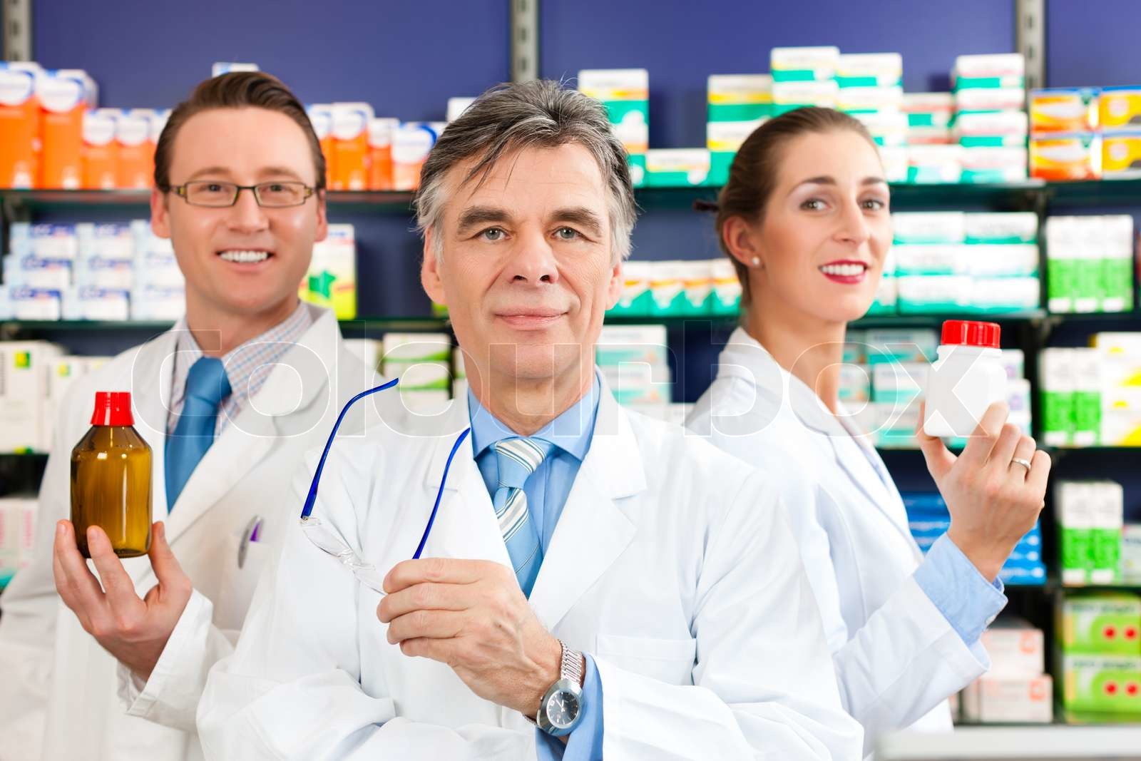 Team of pharmacists in pharmacy | Stock image | Colourbox