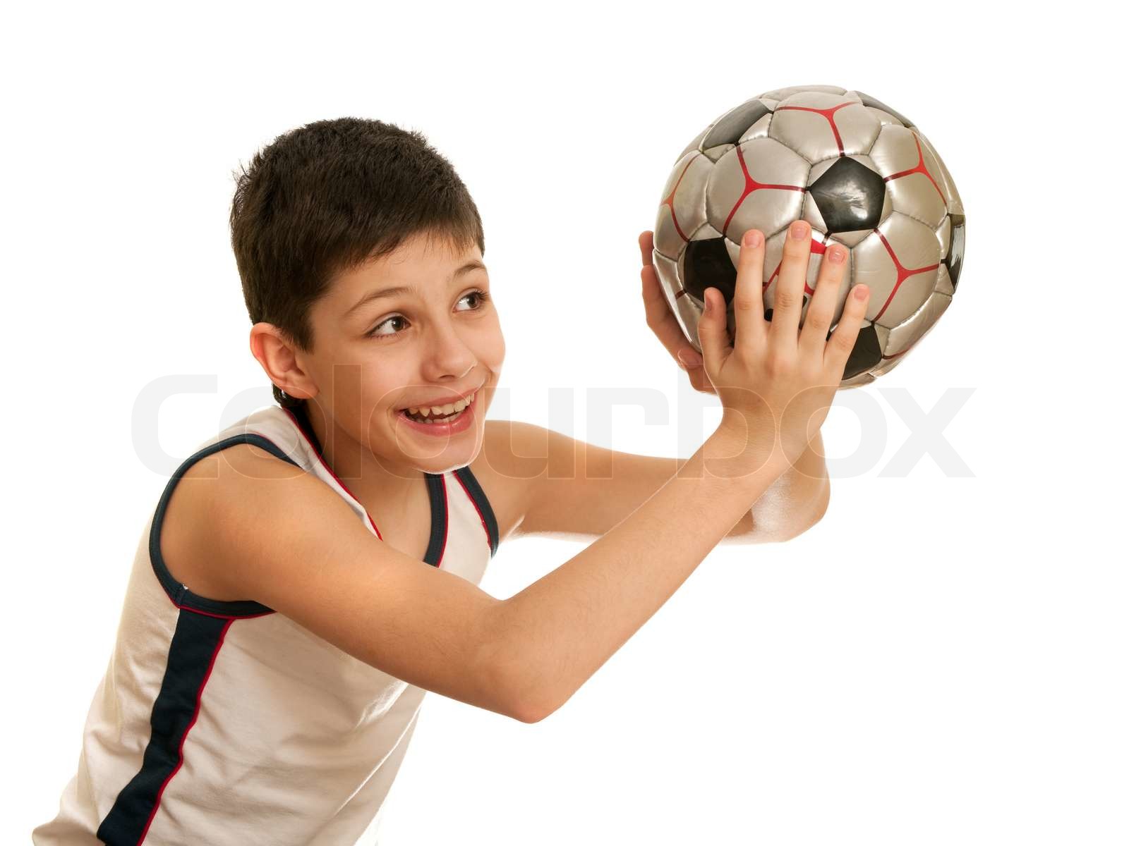 Teen throwing a ball | Stock image | Colourbox