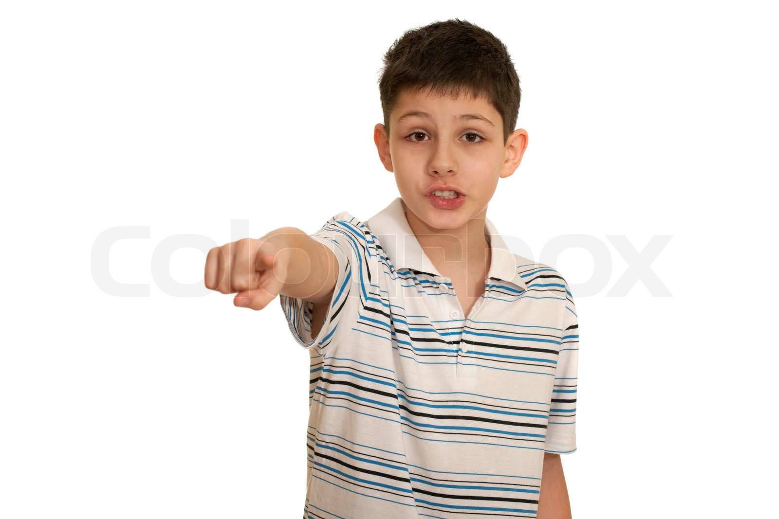 Speaking boy pointing forward | Stock image | Colourbox