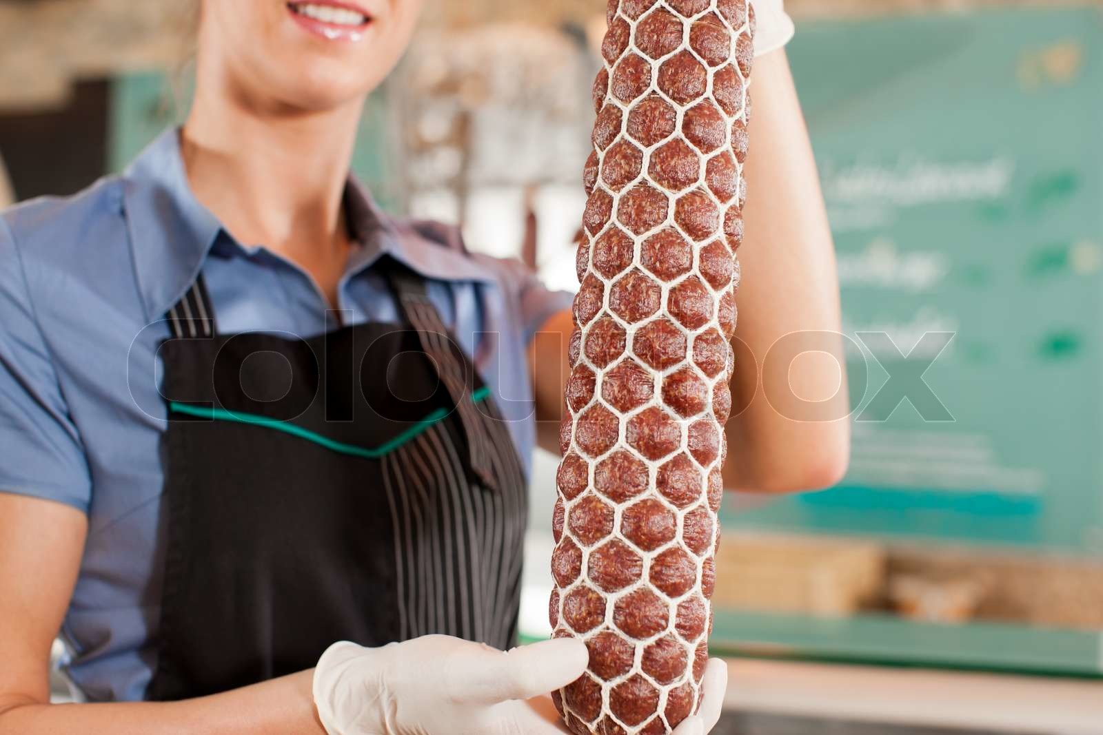 Working in a butchers shop | Stock image | Colourbox