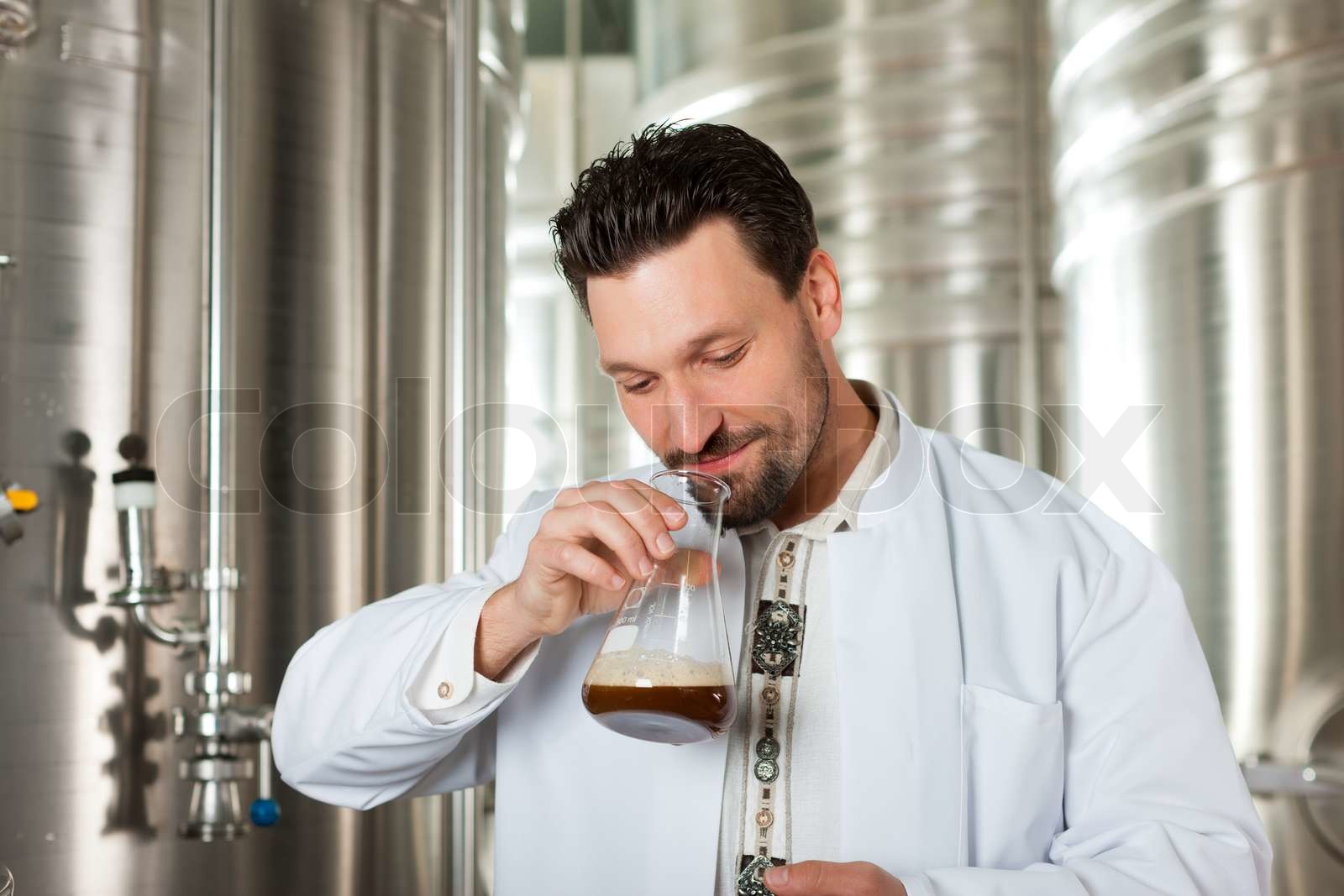 Beer Brewer In His Brewery Examining Stock Image Colourbox