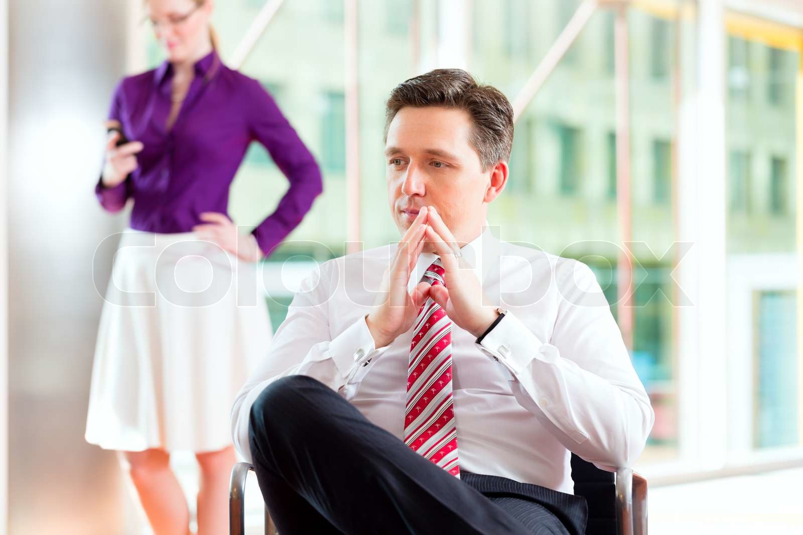 Business people - boss and secretary in office | Stock image | Colourbox