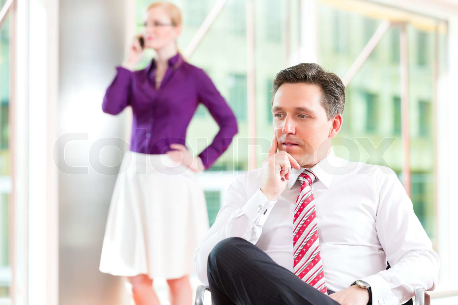 Business people - boss and secretary in office | Stock image | Colourbox