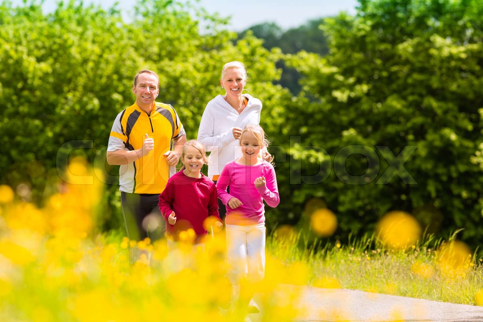 Family jogging for sport outdoors | Stock image | Colourbox