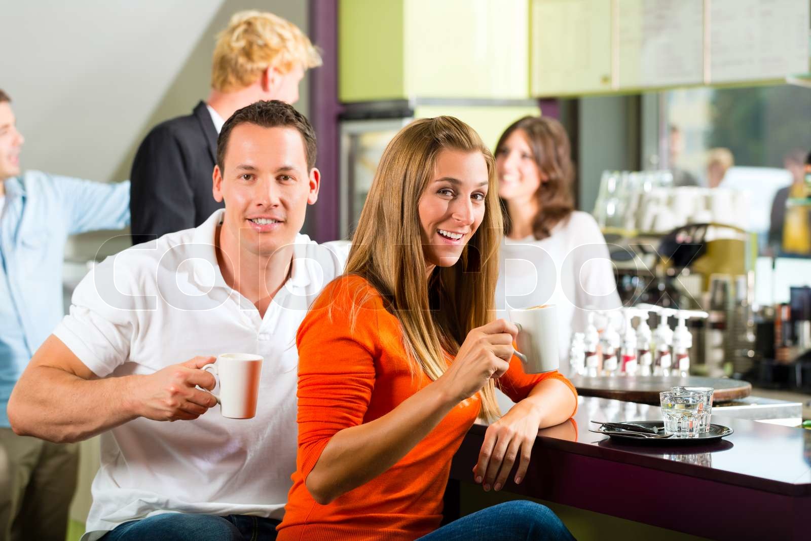 Group of people in Cafe drinking coffee | Stock image | Colourbox