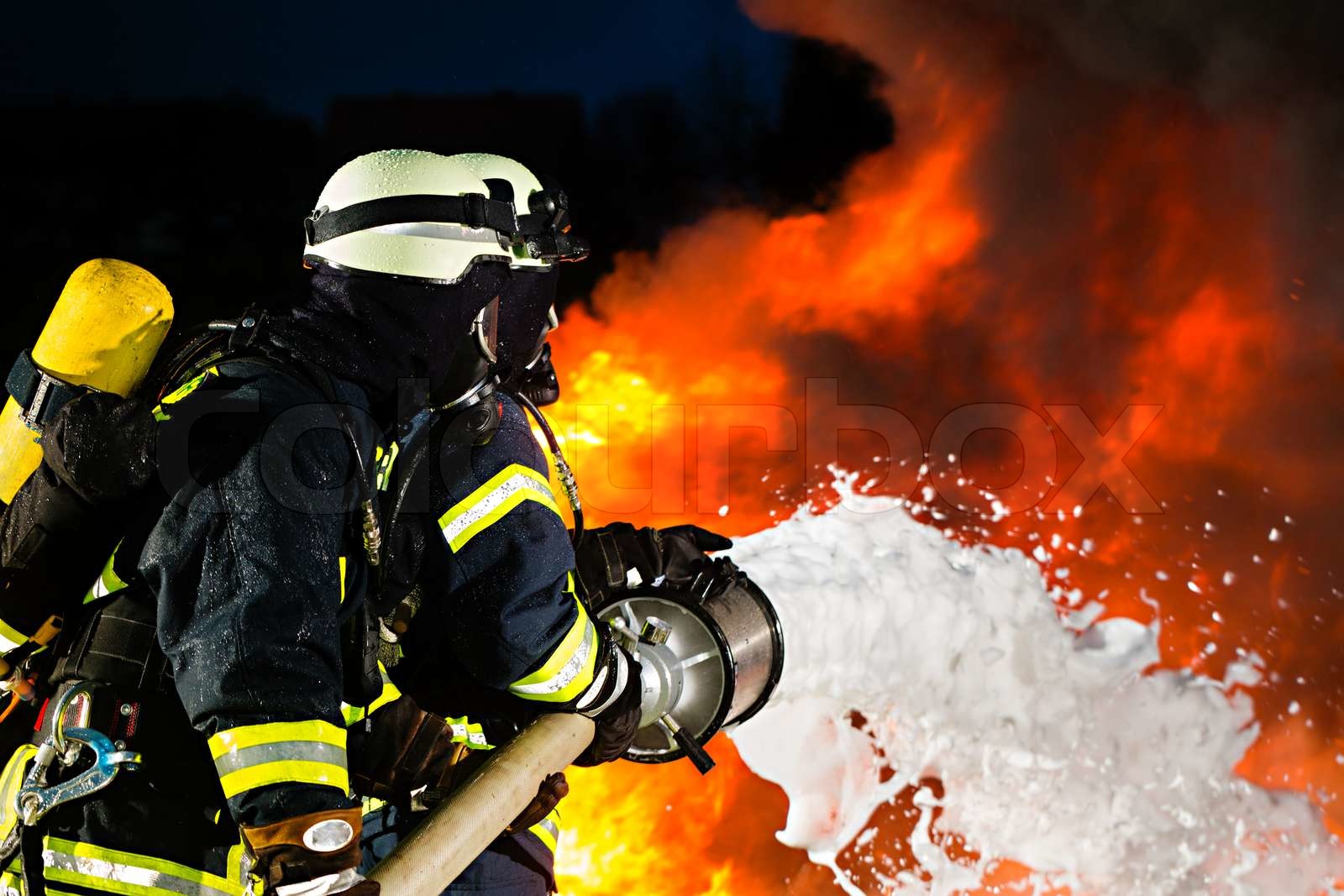Firefighter Firemen Extinguishing A Large Blaze Stock Image Colourbox
