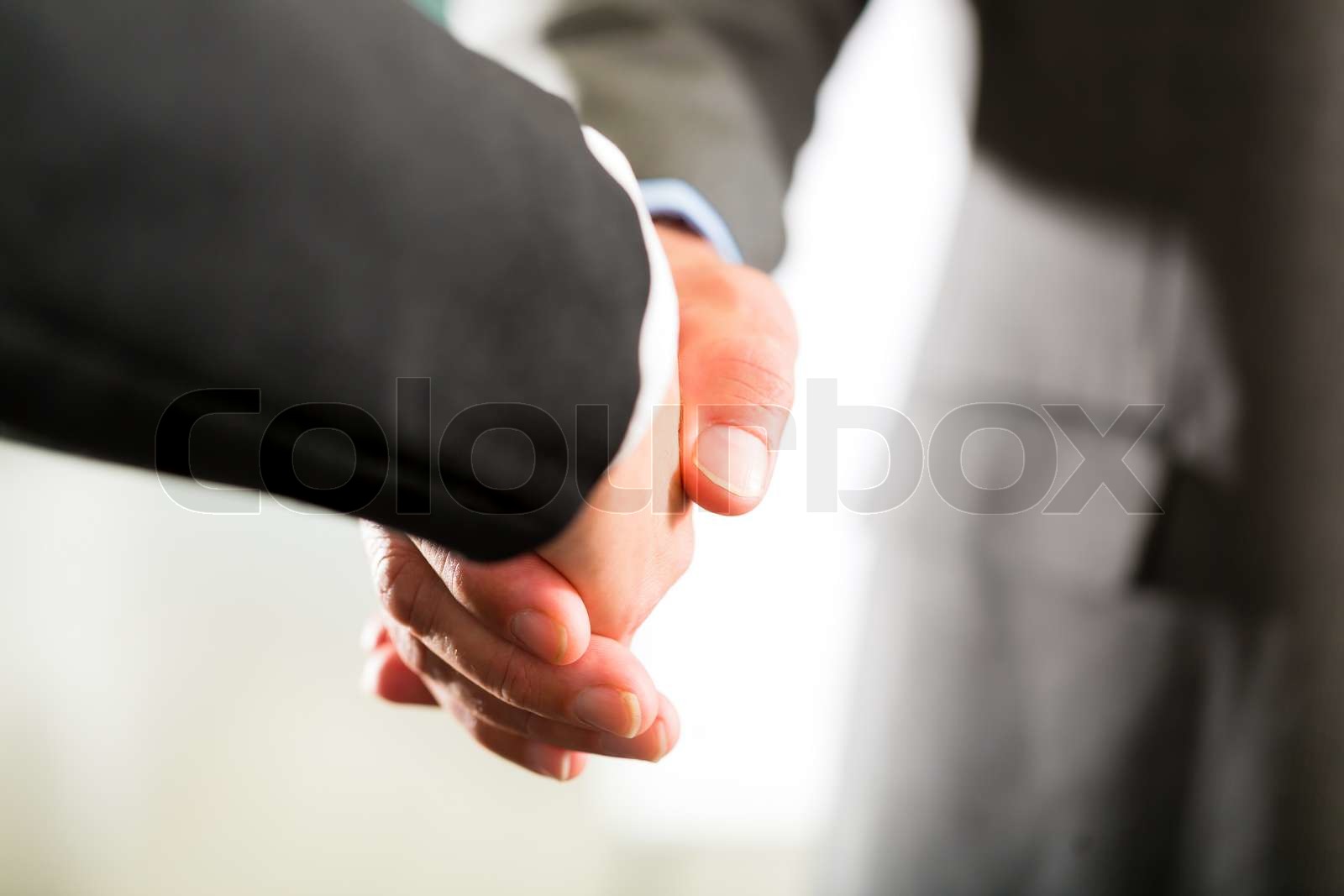 Business people doing Handshake | Stock image | Colourbox