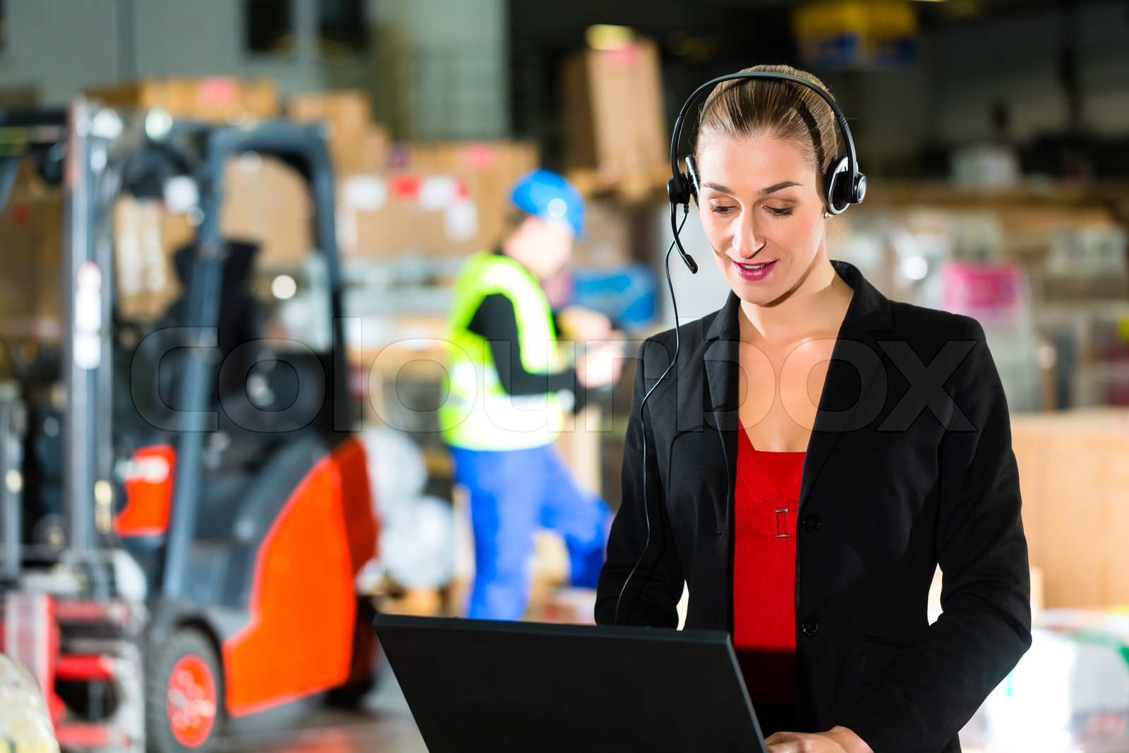 dispatcher using headset at warehouse of forwarding | Stock image ...