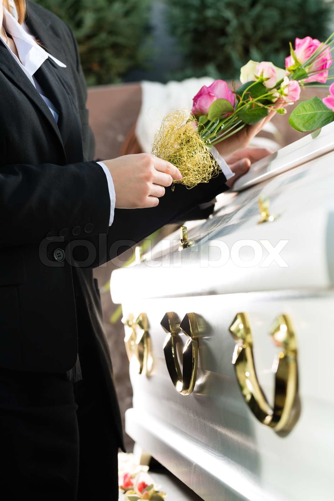 Mourning People at Funeral with coffin | Stock image | Colourbox