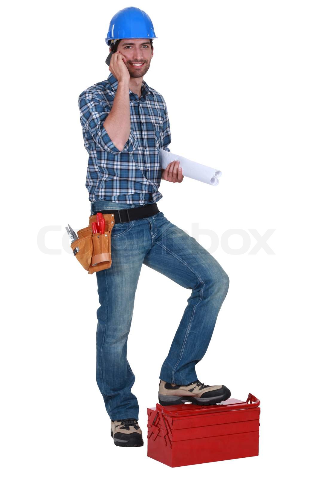 craftsman talking on his cell | Stock image | Colourbox