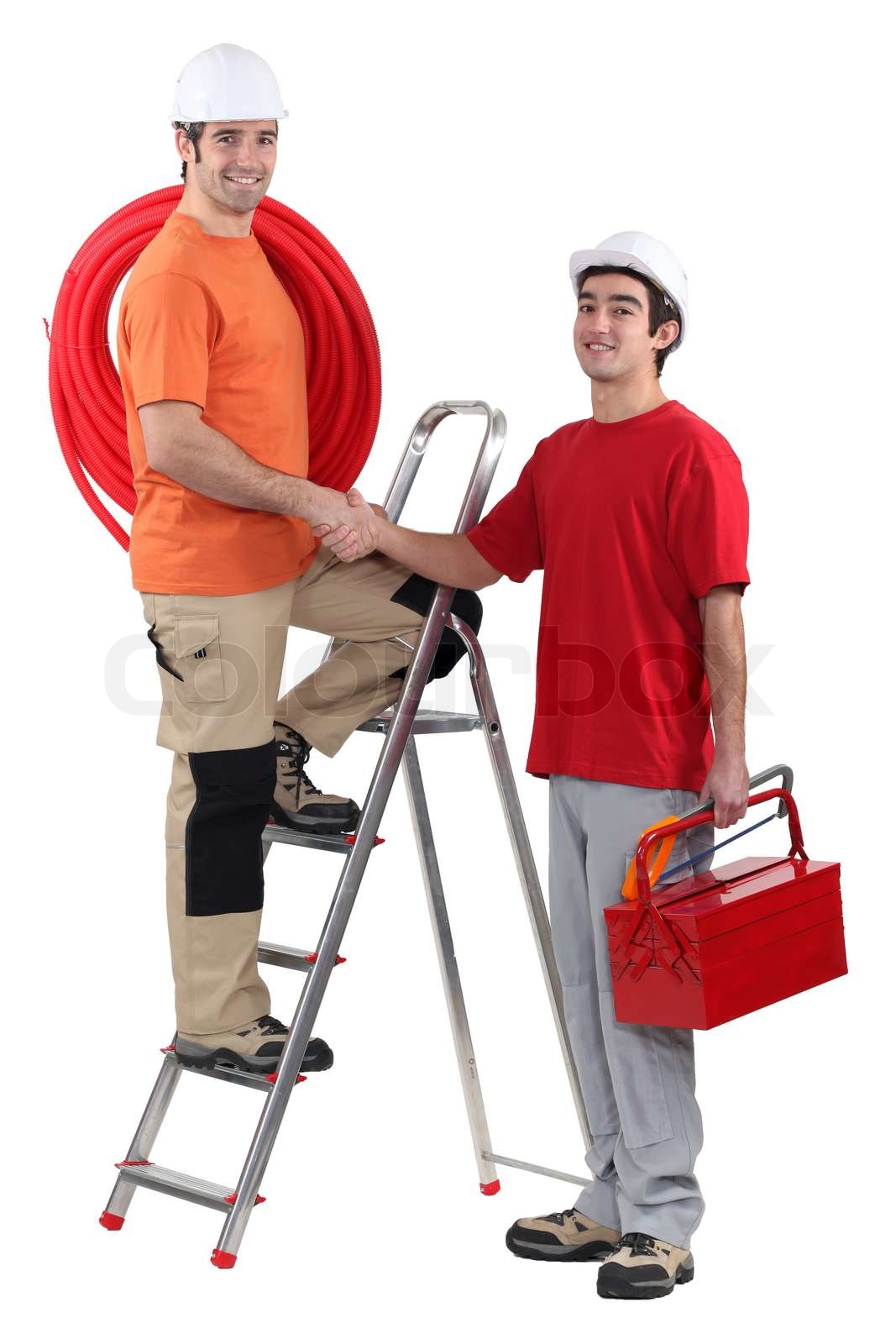 Electrician shaking hands | Stock image | Colourbox